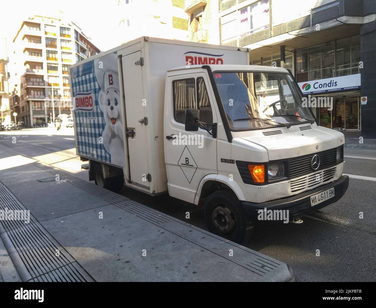 Old white van of pastry delivery in the city. Mercedes Benz 408D Stock ...