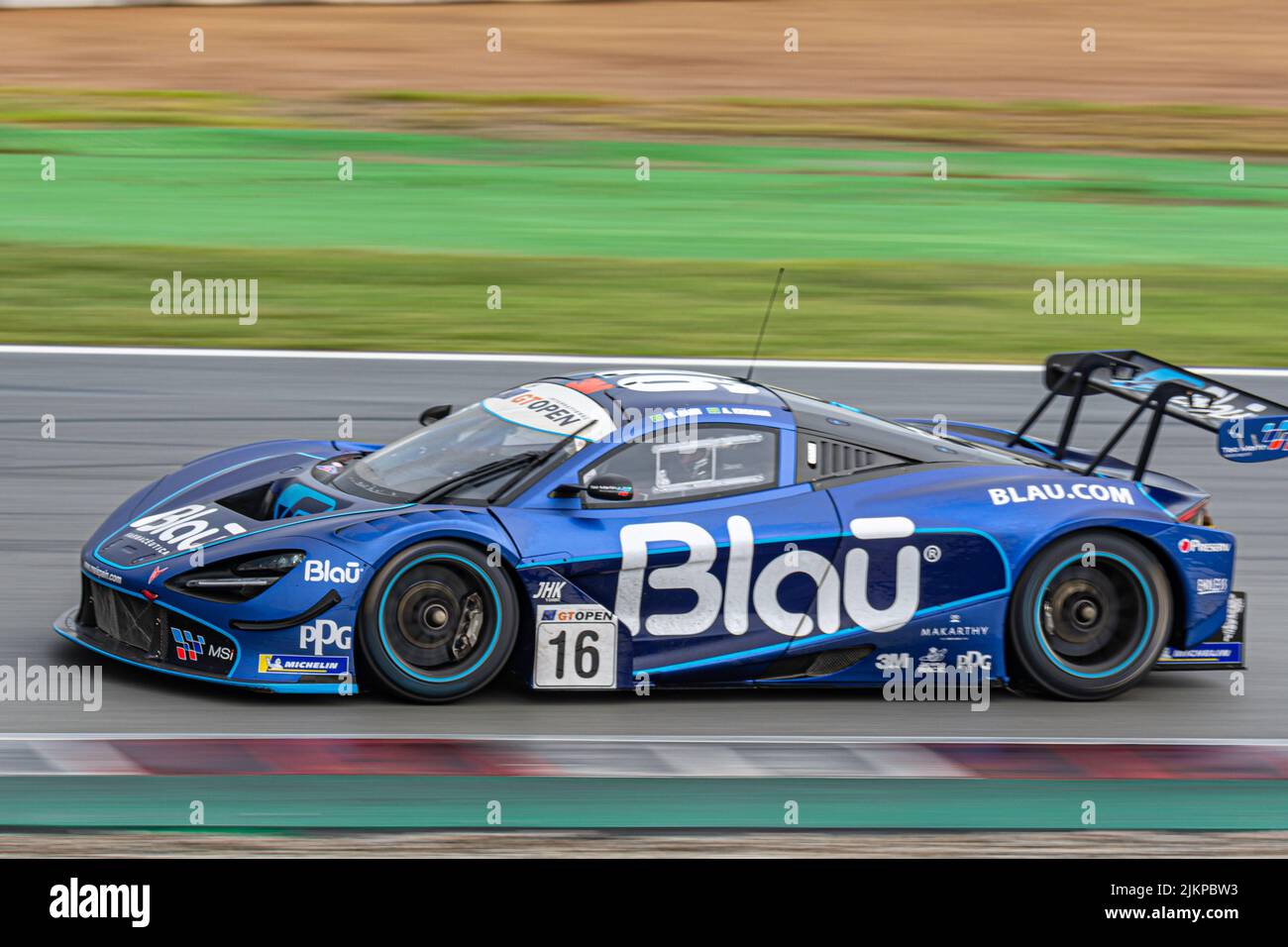 Super fast car in the track in cloudy and rainy day, McLaren 720s Stock ...