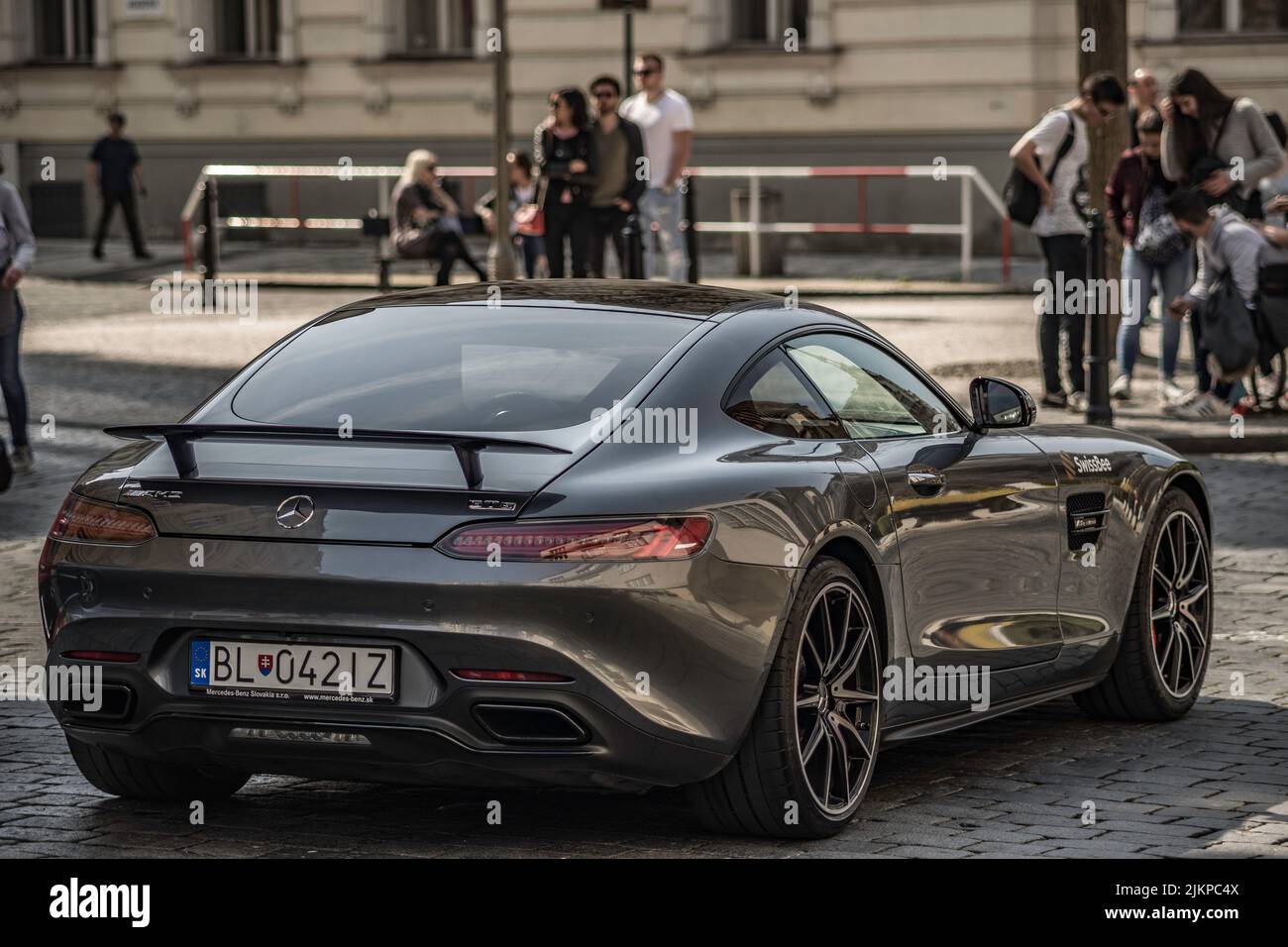 Modern gray fast car parked in the street. Mercedes Benz C120 AMG GT ...