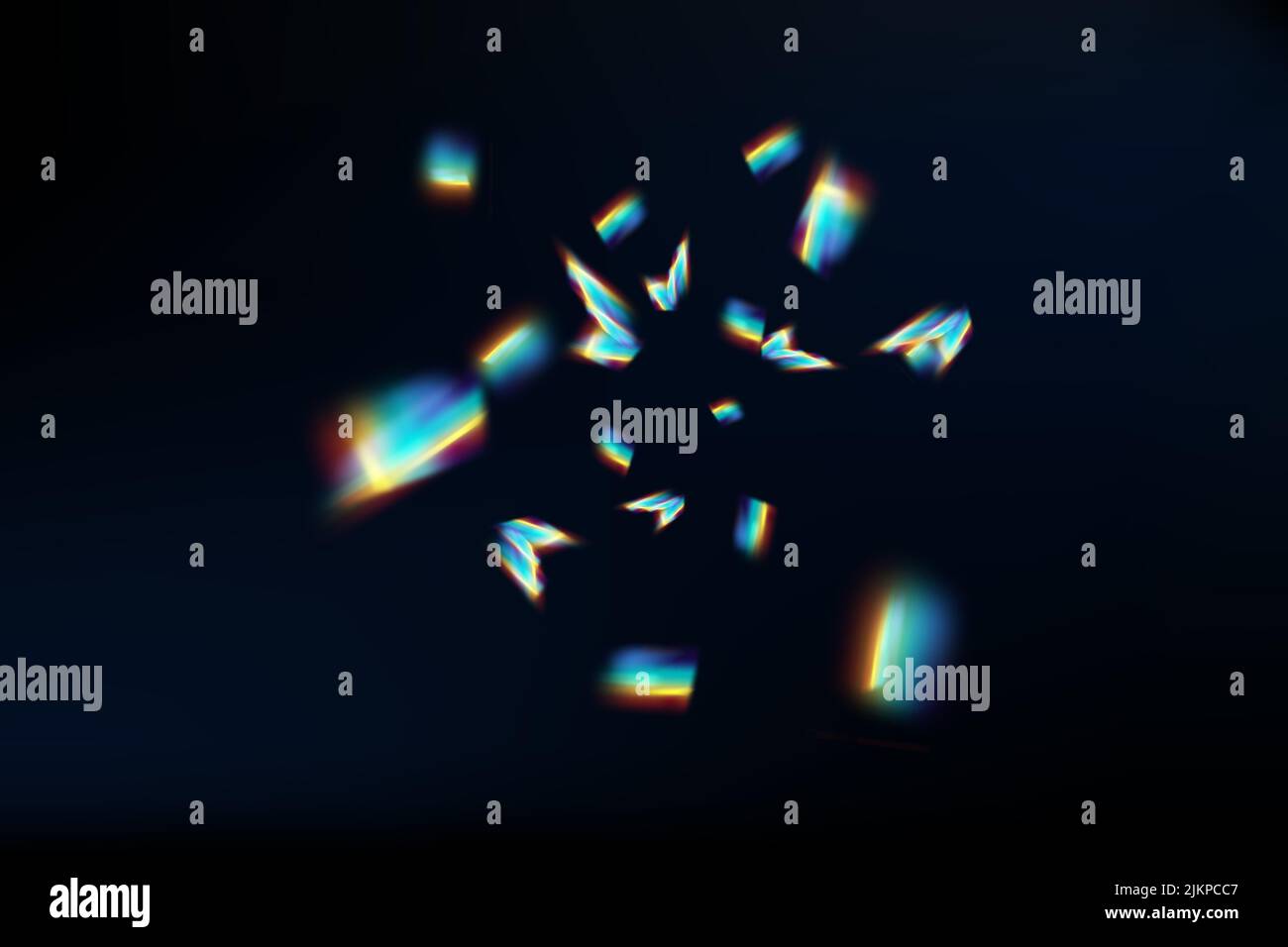 Glare or reflection from water and glass.Rainbow highlights on a black ...