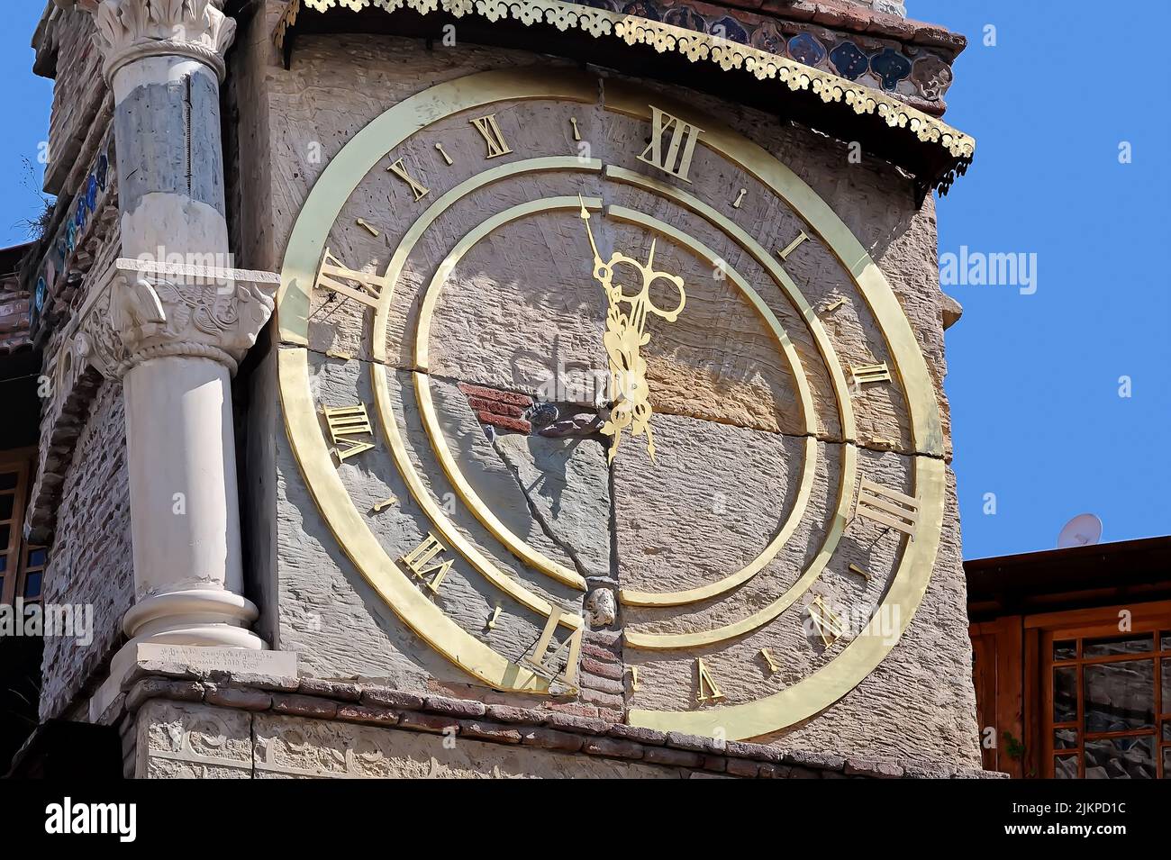 Clock on Drunk clock tower of puppet theater in Tbilisi Georgia Stock ...