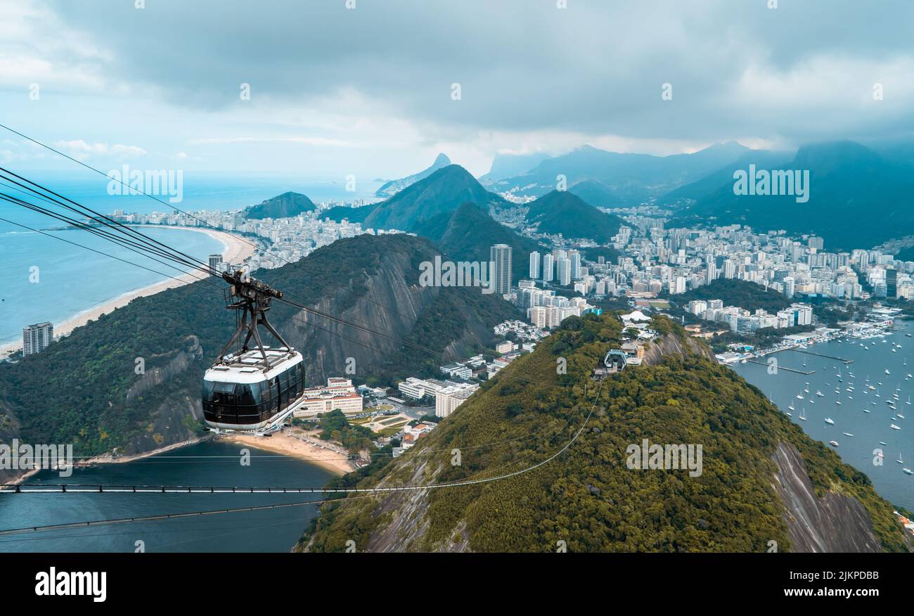 A mesmerizing view of downtown Rio with cable car seen from the ...