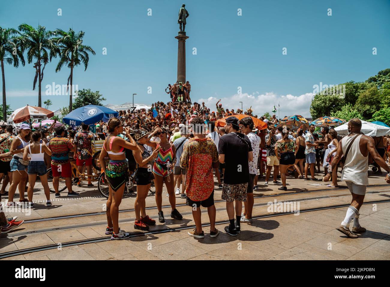 A group of people having fun outdoors during Carnival in downtown Rio ...