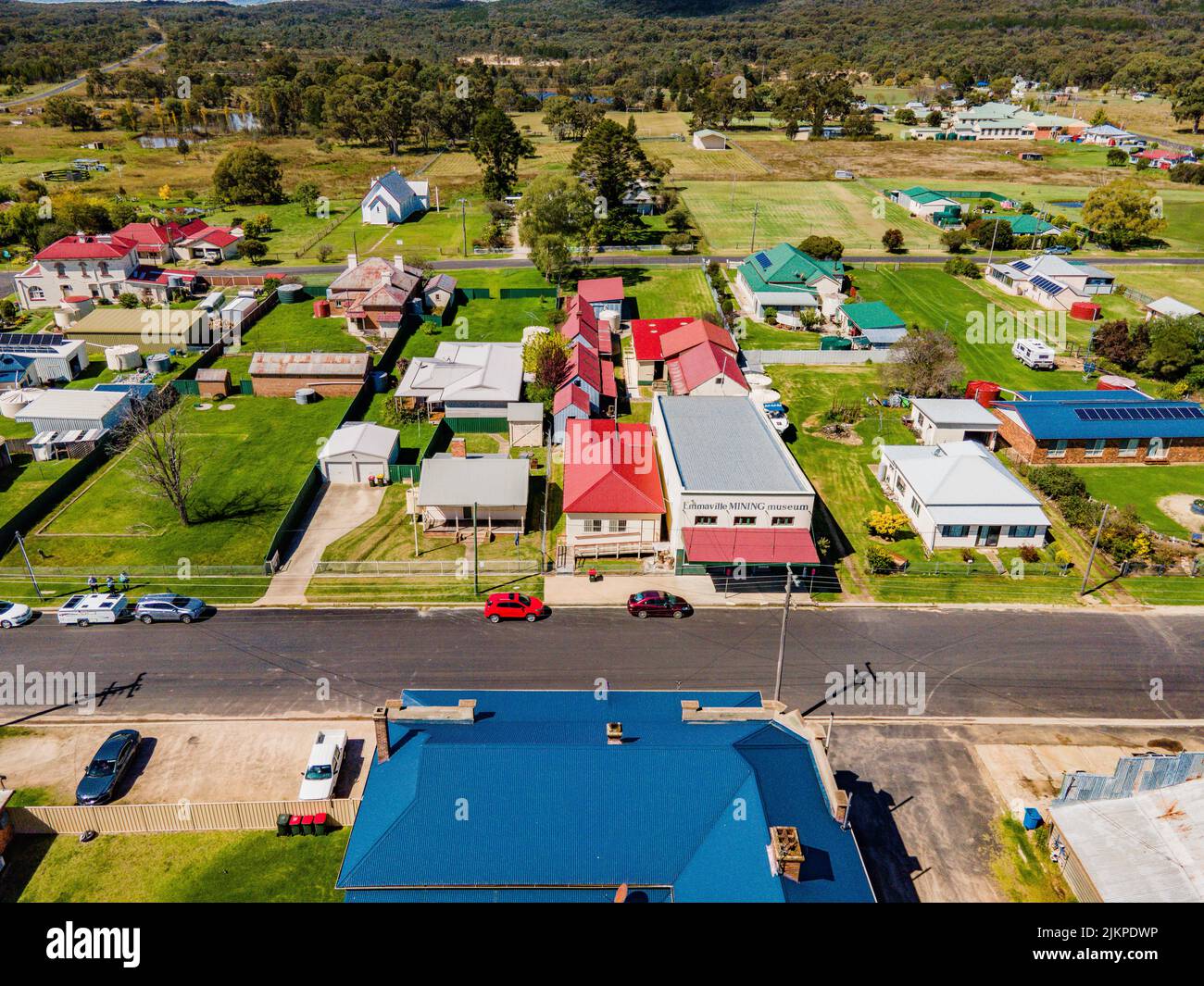 An aerial shot of the lush green neighborhoods of Emmaville, Australia ...