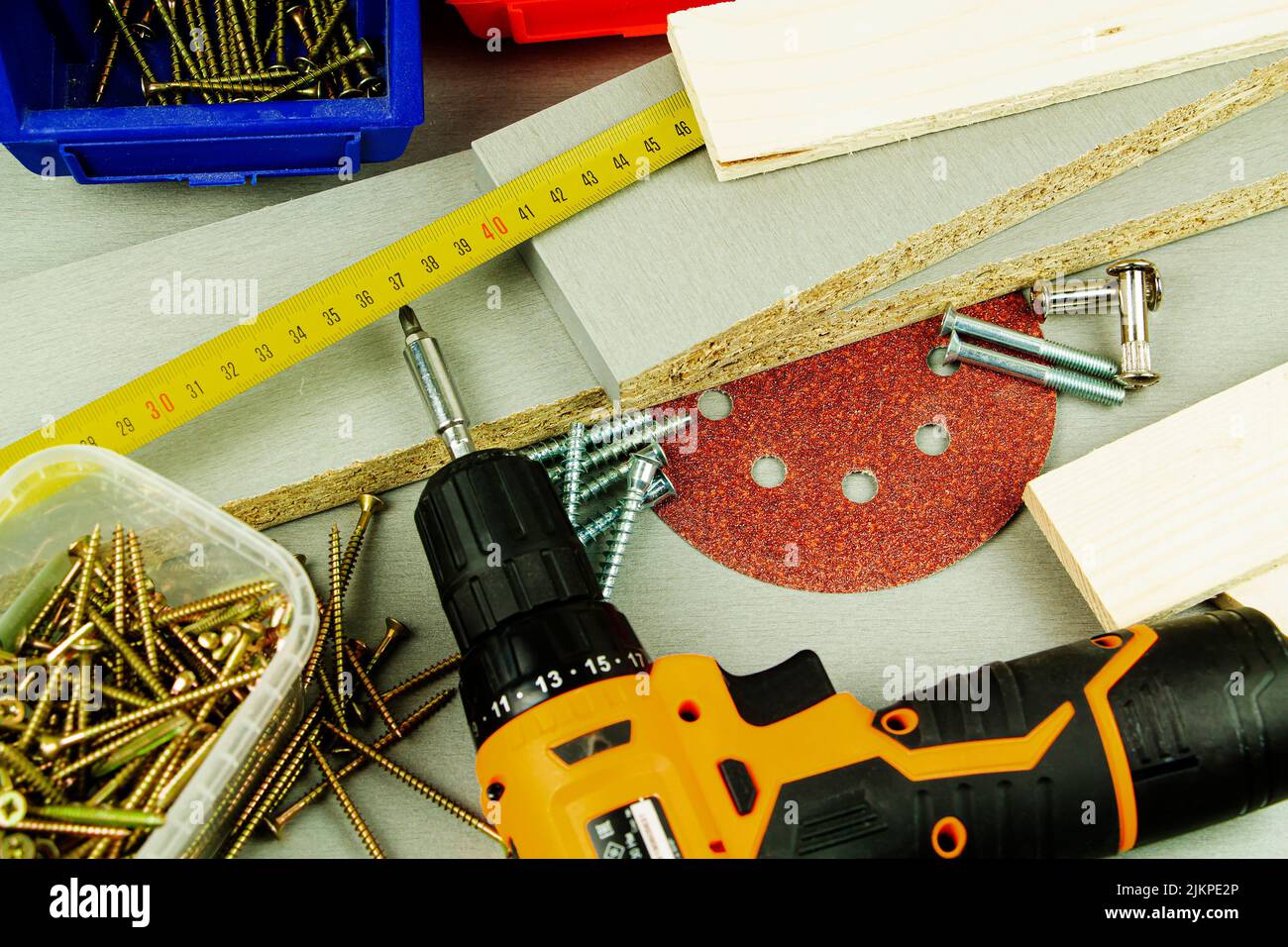 tools for repair and construction. Screwdriver, furniture screws ...