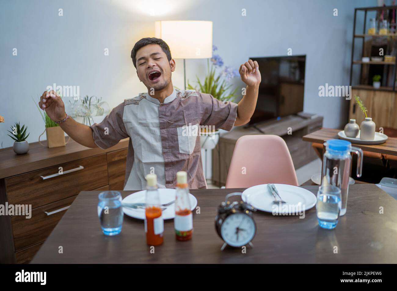 Malaysia family in room hi-res stock photography and images - Alamy