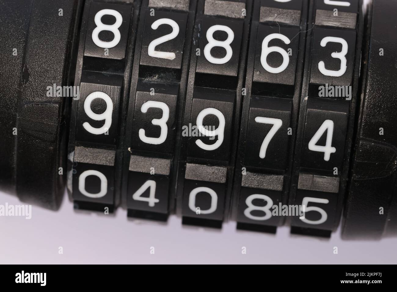 A closeup of a black padlock with various combinations Stock Photo - Alamy