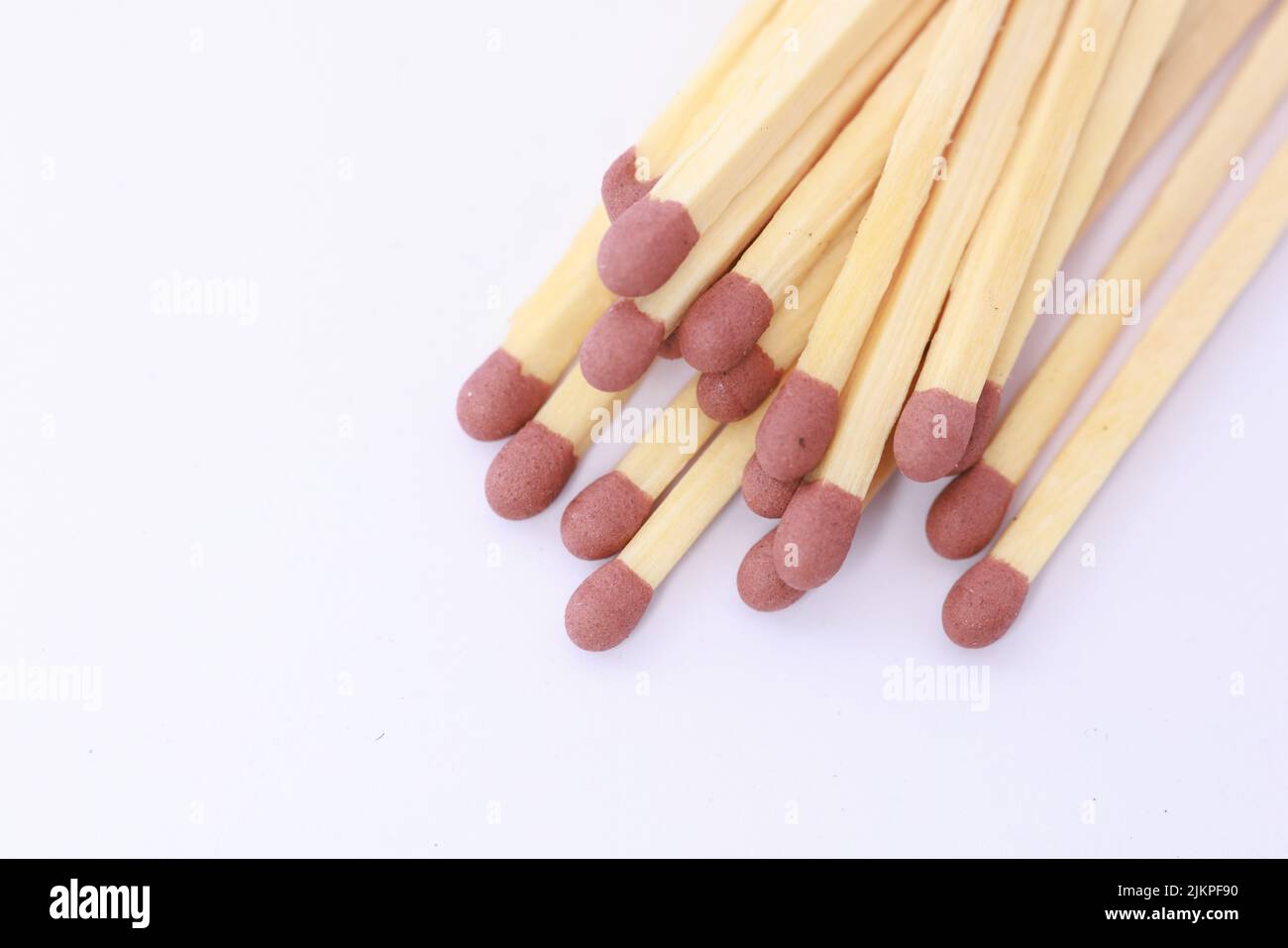 A closeup of match sticks isolated on a white background with copyspace ...