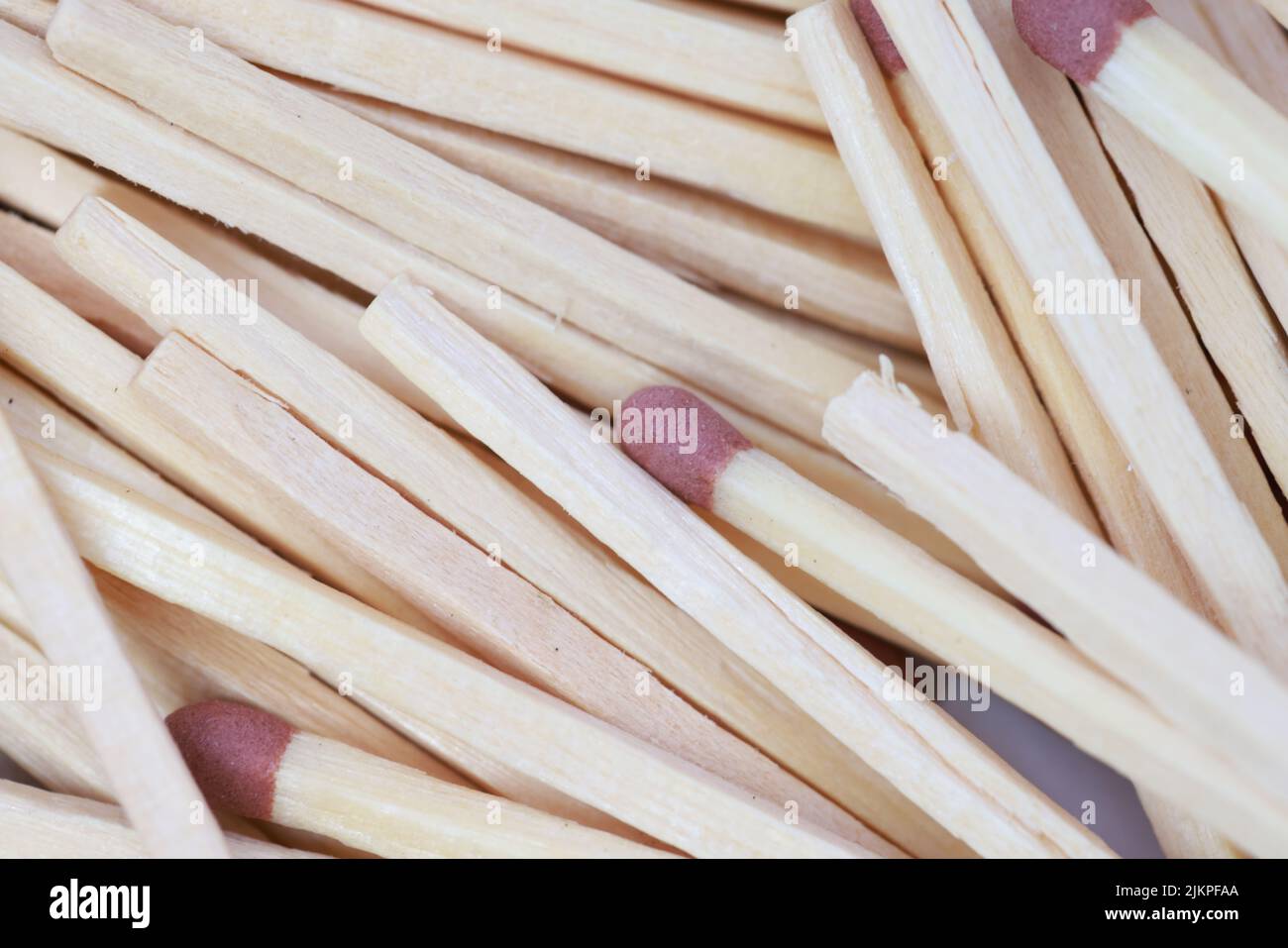 A closeup of a pile of match sticks with red edges Stock Photo - Alamy