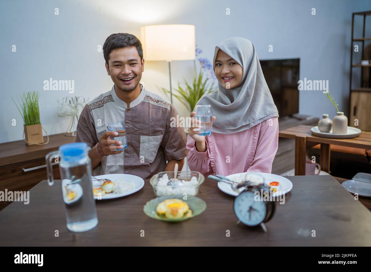 muslim couple having breakfast or sahur early morning Stock Photo - Alamy