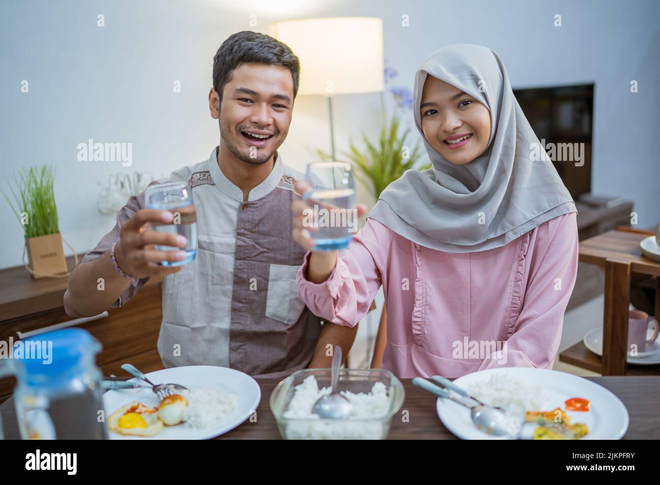 muslim couple having breakfast or sahur early morning Stock Photo - Alamy