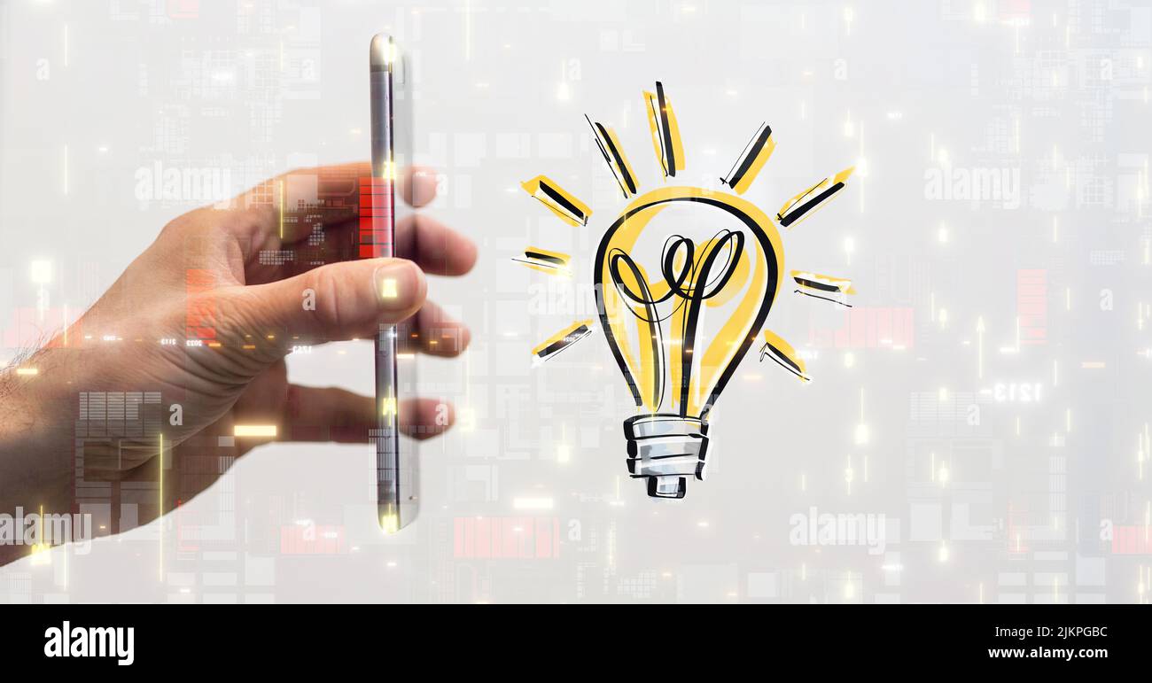 A person's hand holding a phone against a glowing light bulb icon Stock ...