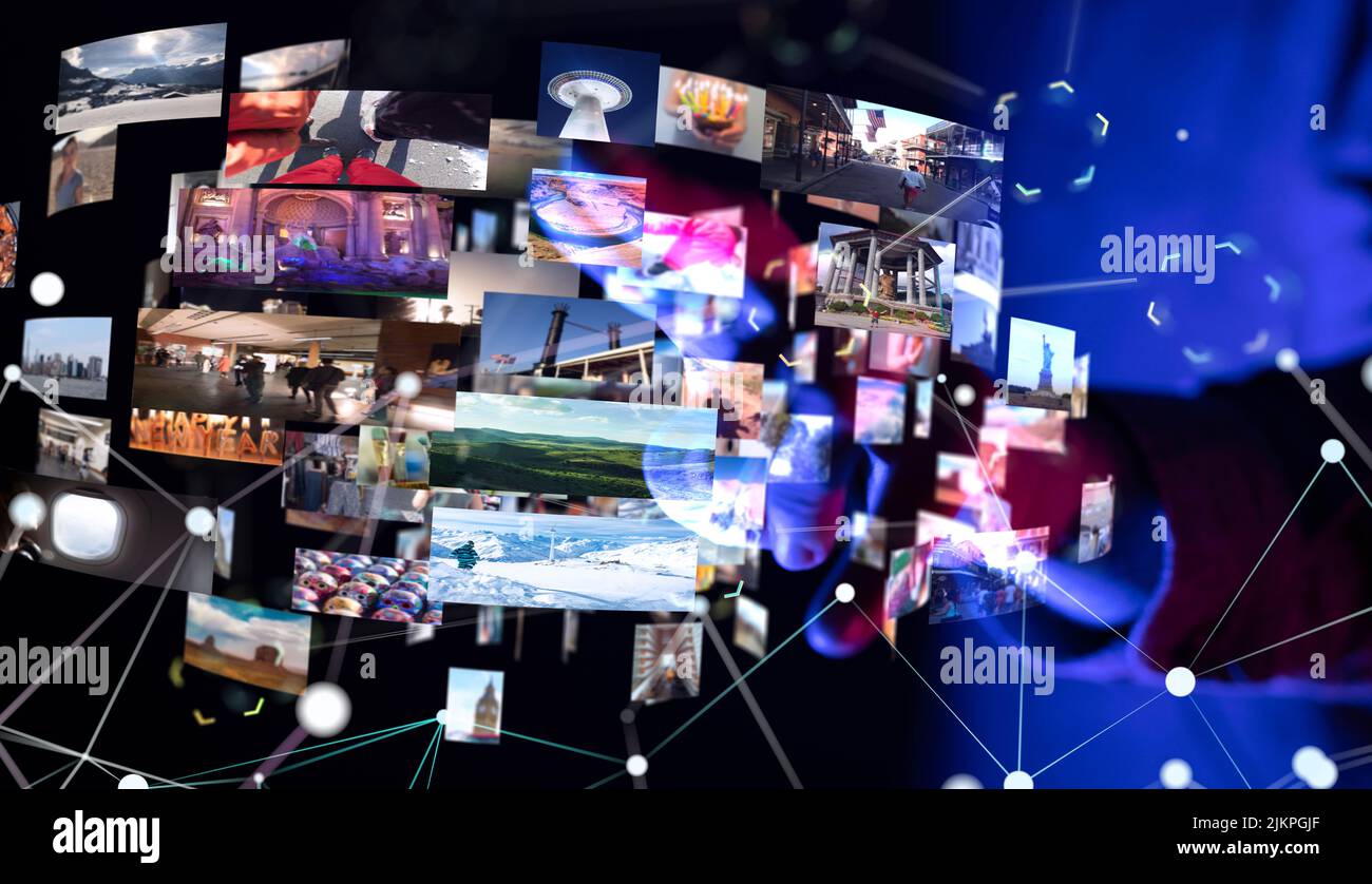 A streaming still with different images and a blurred hand on a dark ...