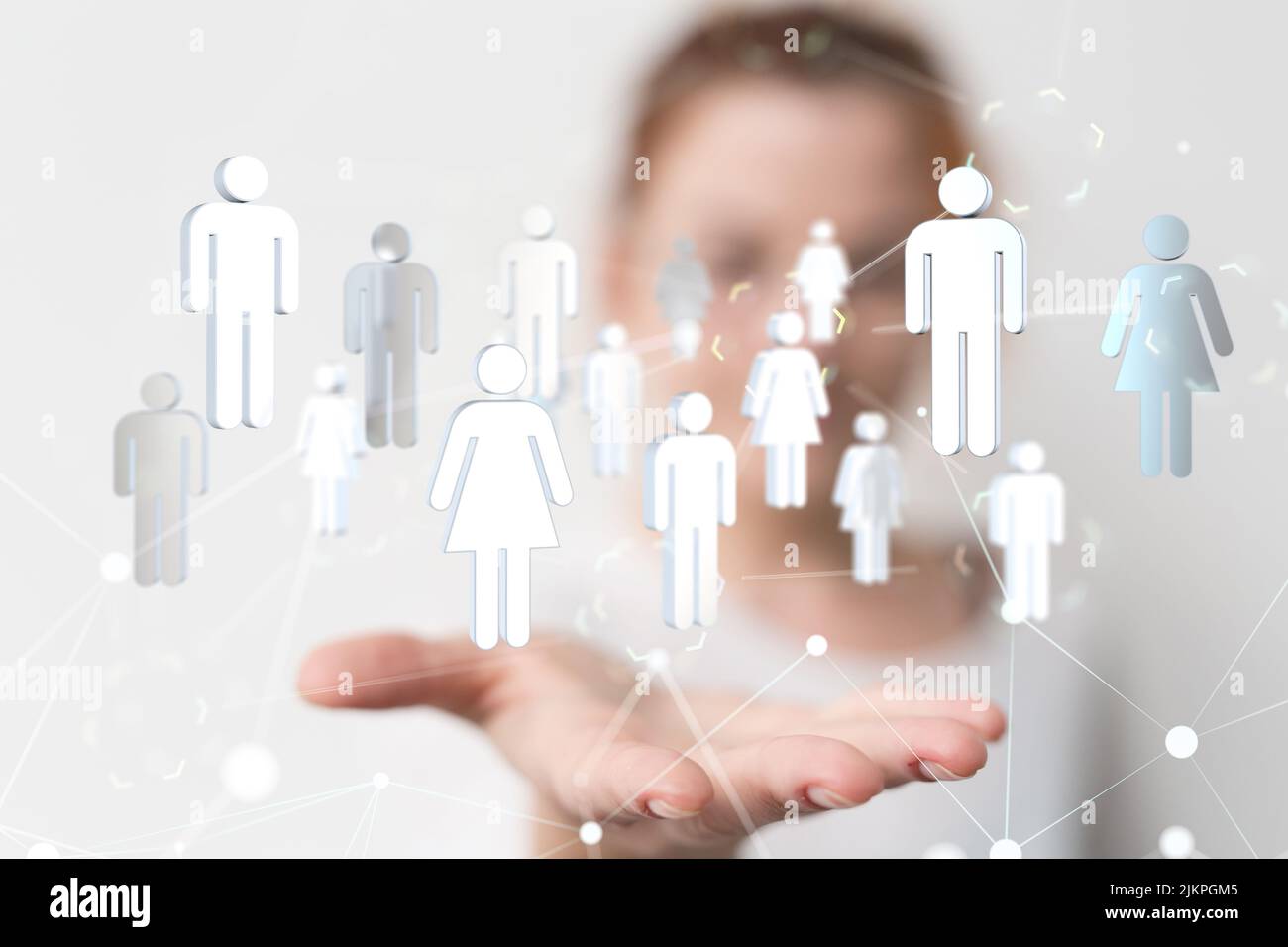 An illustrated network graphic with white icons over a person's hand ...