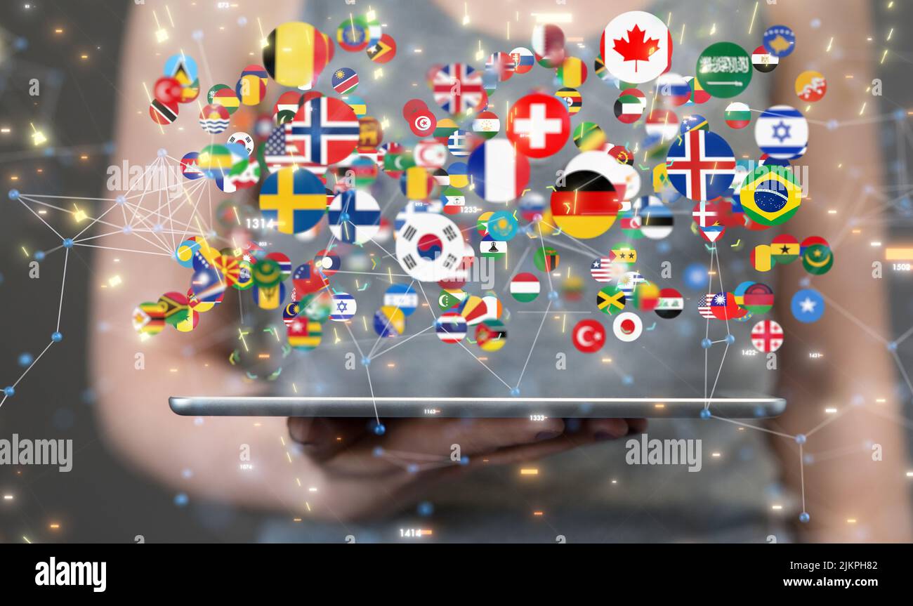 A 3D rendering of country flags over hand holding computer tablet ...
