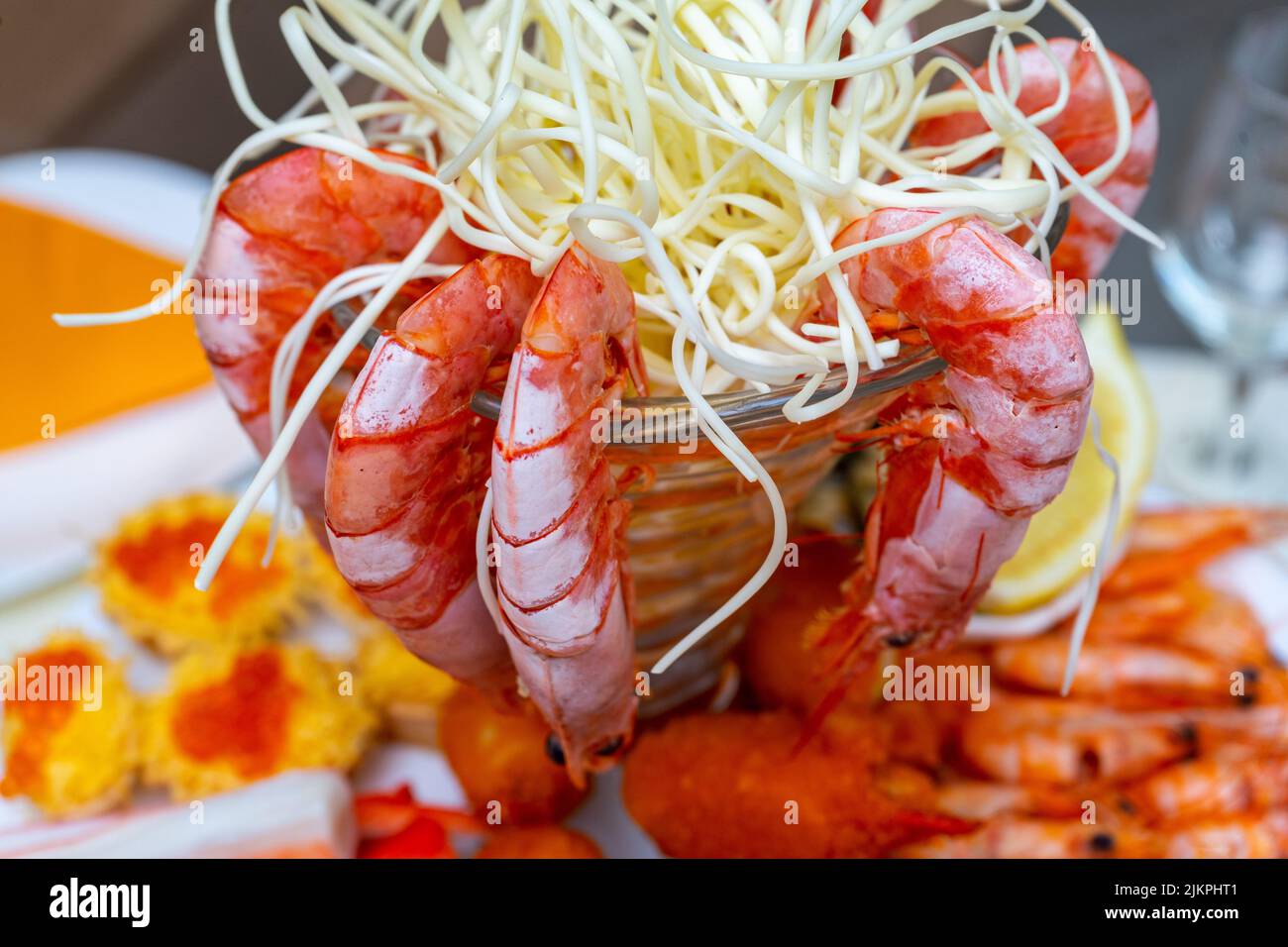 COLD SEAFOOD SNACKS. Boiled crayfish with cheese, shrimp and red caviar ...