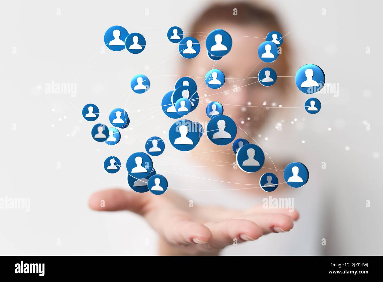 A 3d rendering of human figures in blue circles floating above a hand showing connection and ...