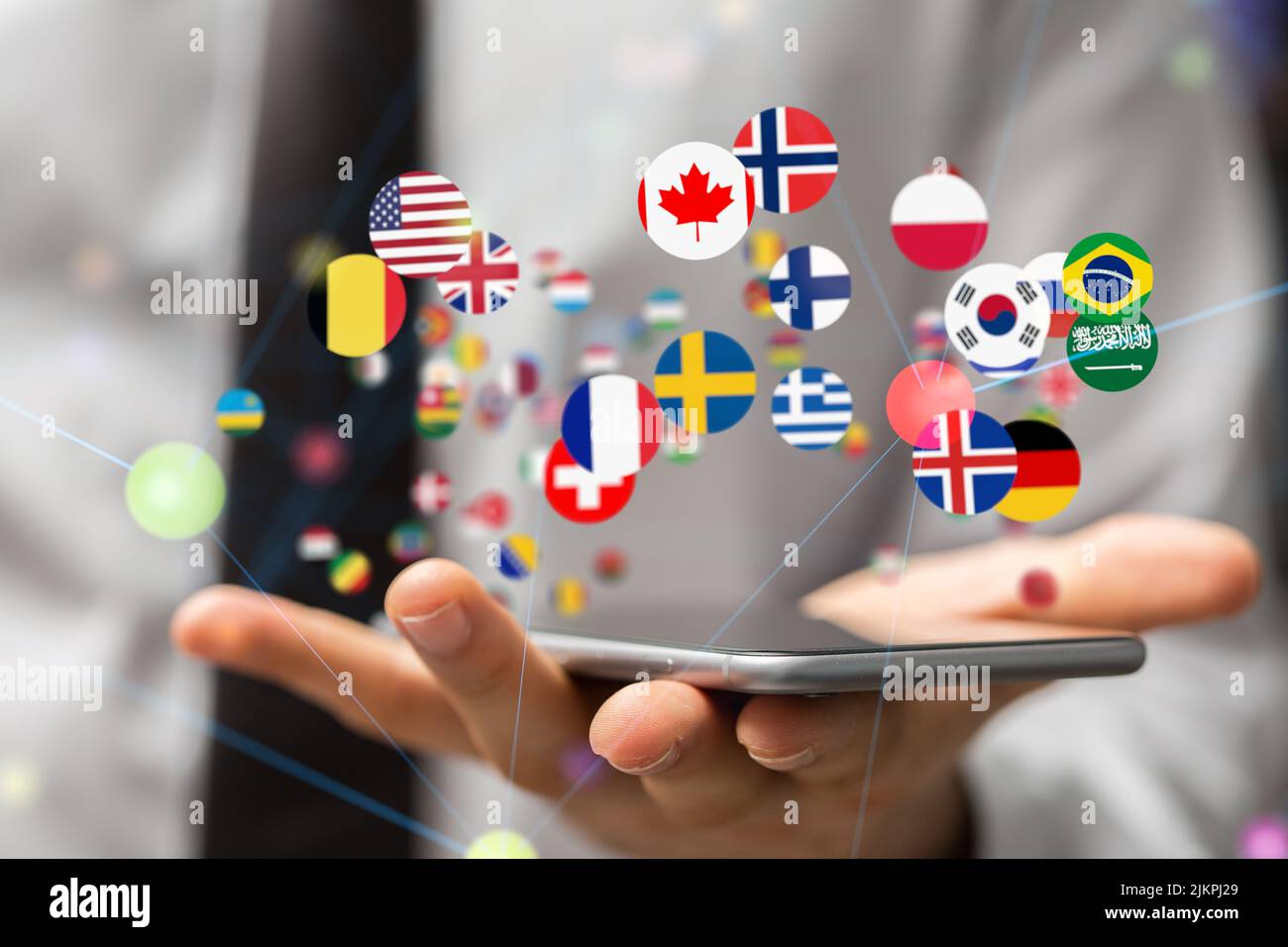 A 3D rendering of international flags floating above a smartphone for global network and ...
