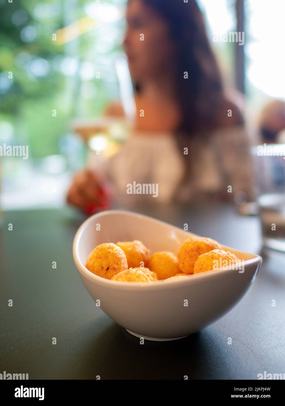 female lady having prosecco in a bar outdoors Stock Photo - Alamy