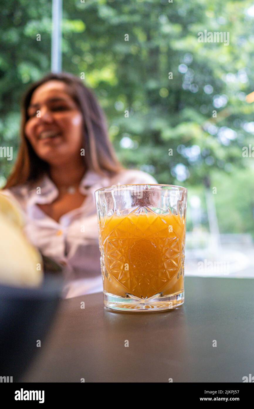 female lady having prosecco in a bar outdoors Stock Photo - Alamy