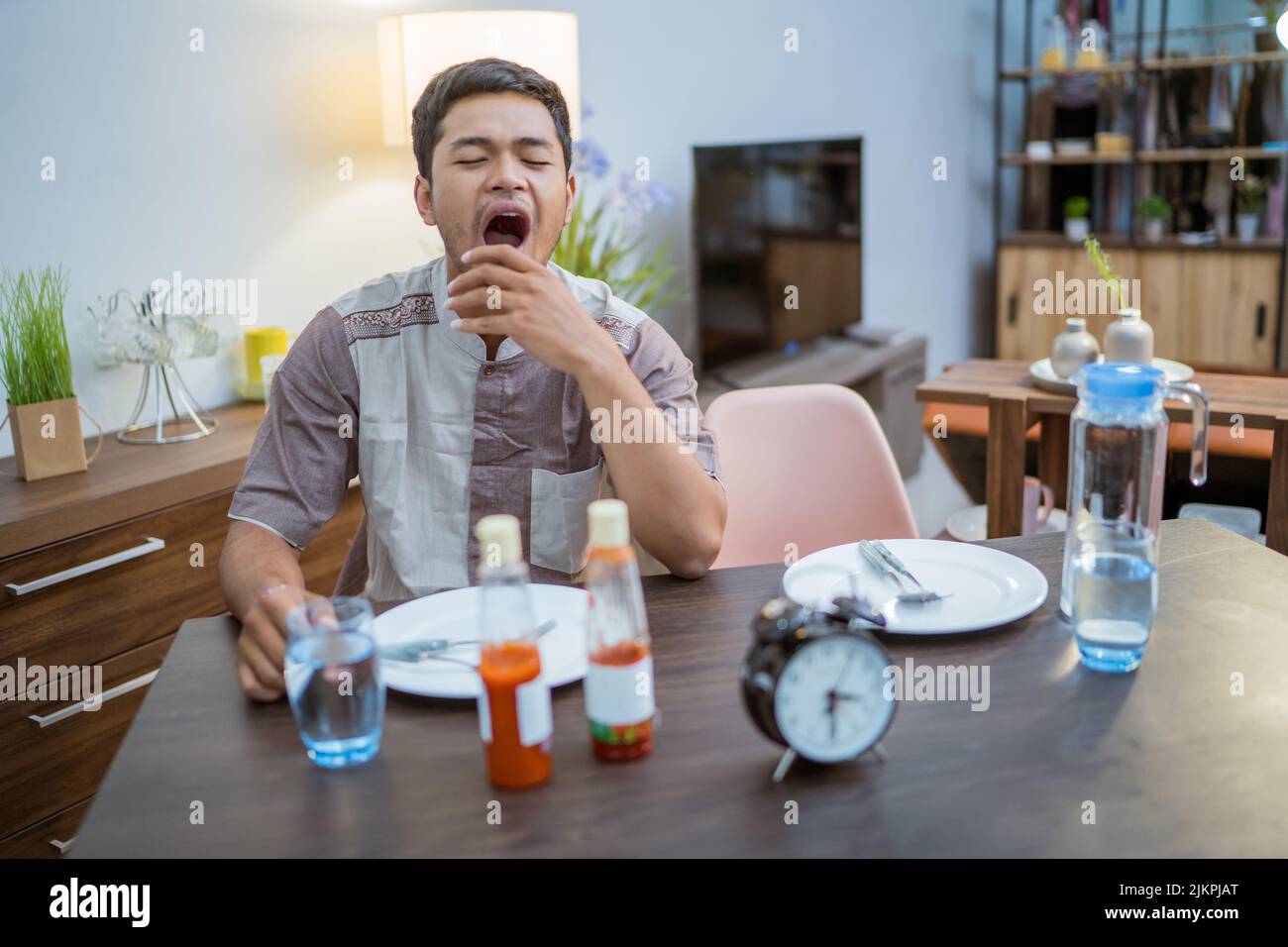 Malaysia family in room hi-res stock photography and images - Alamy