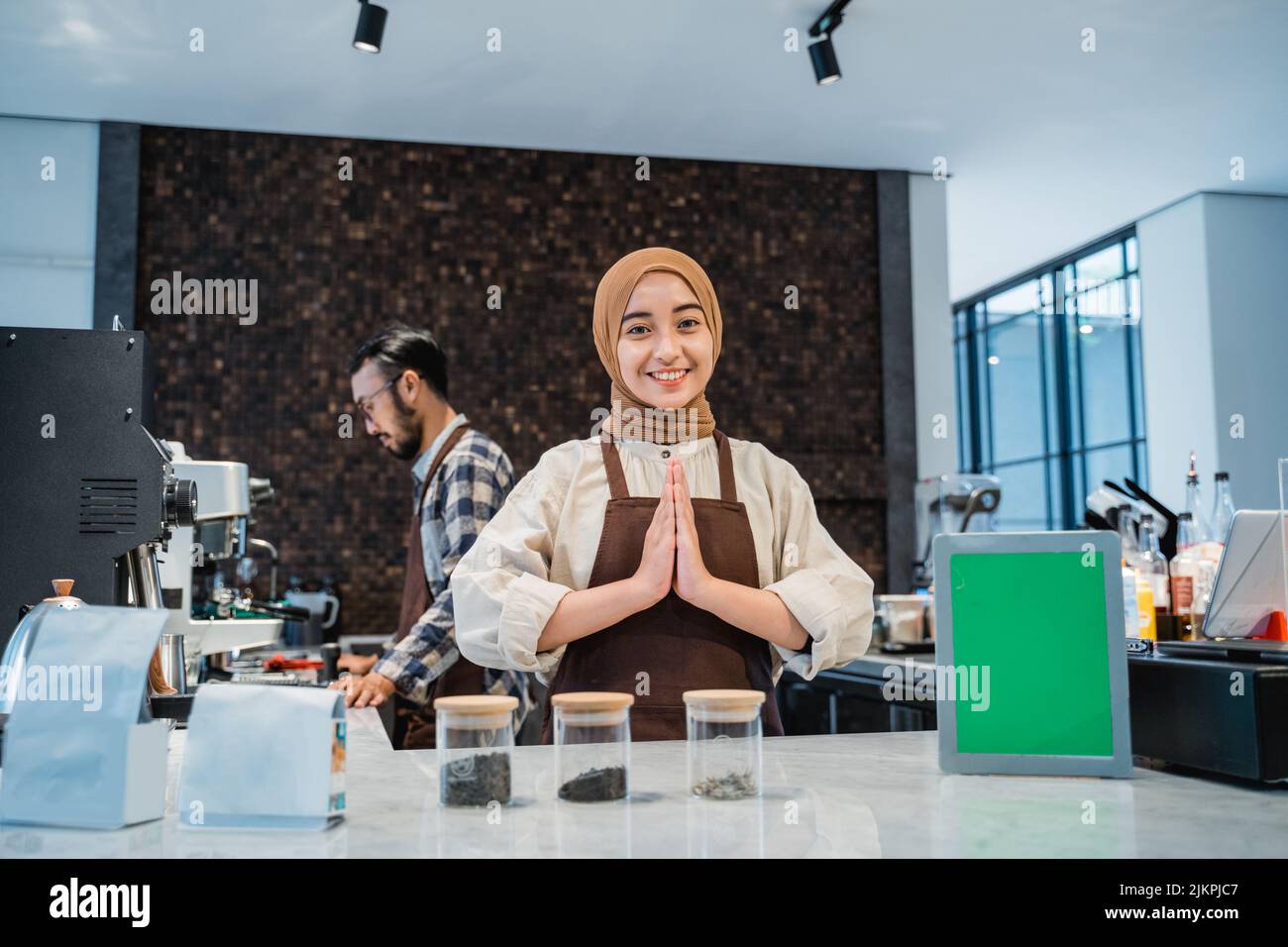 Muslim man restaurant owner hi-res stock photography and images - Alamy