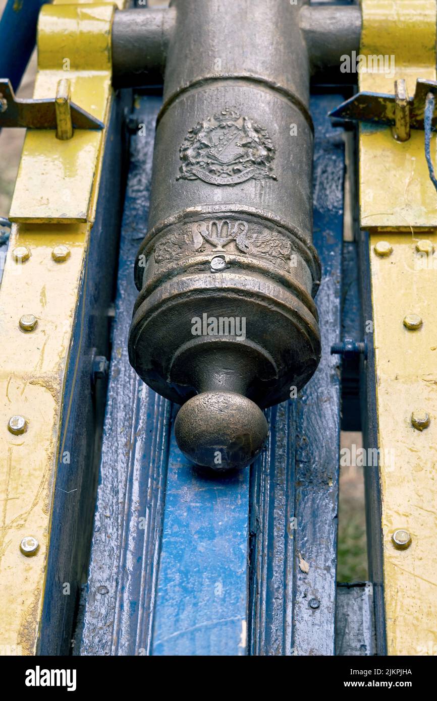 Vintage swedish cannons and metal cannonballs. Ancient military arsenal ...