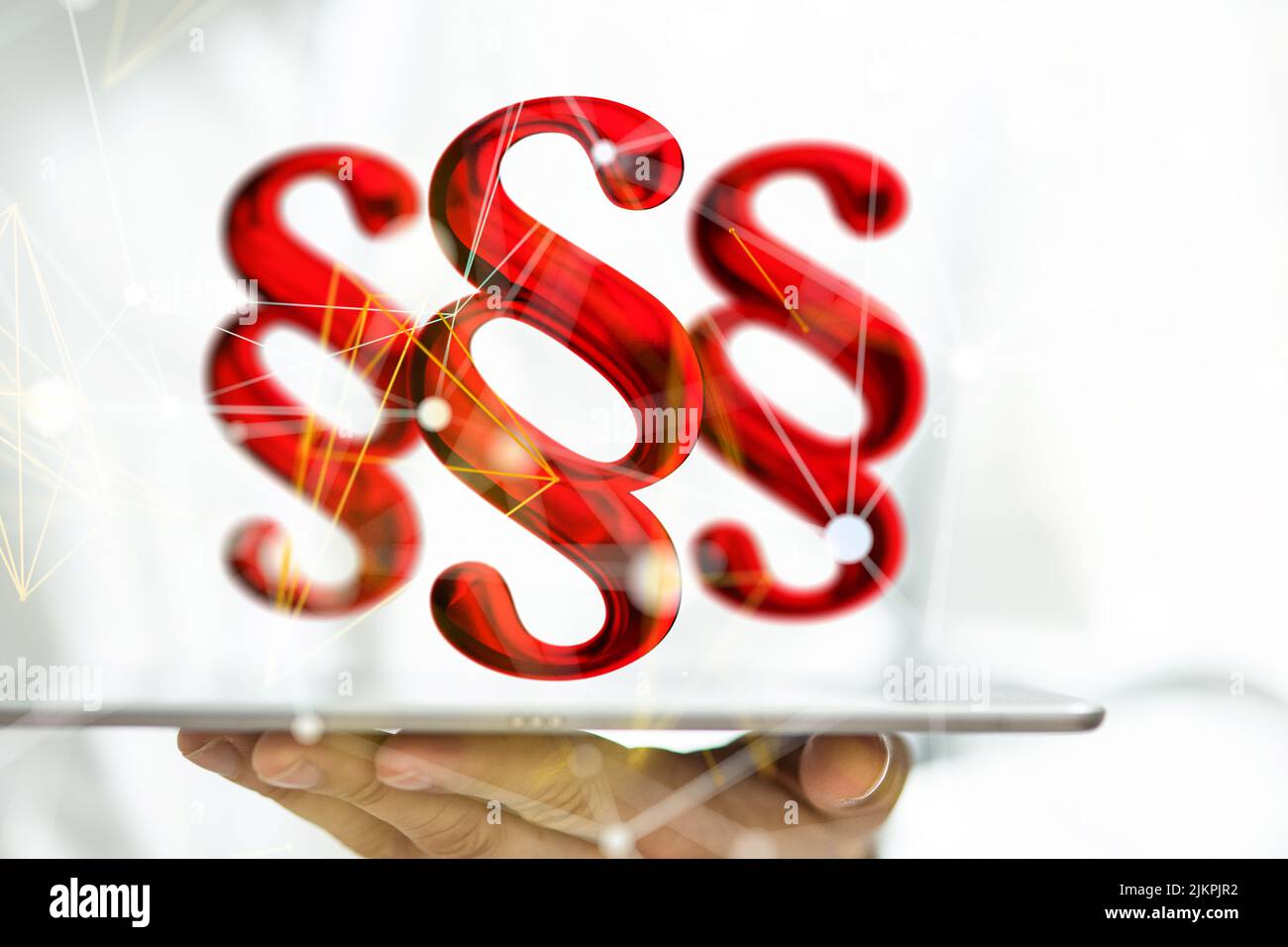 A 3D rendering of floating paragraph section signs on a man's tablet ...