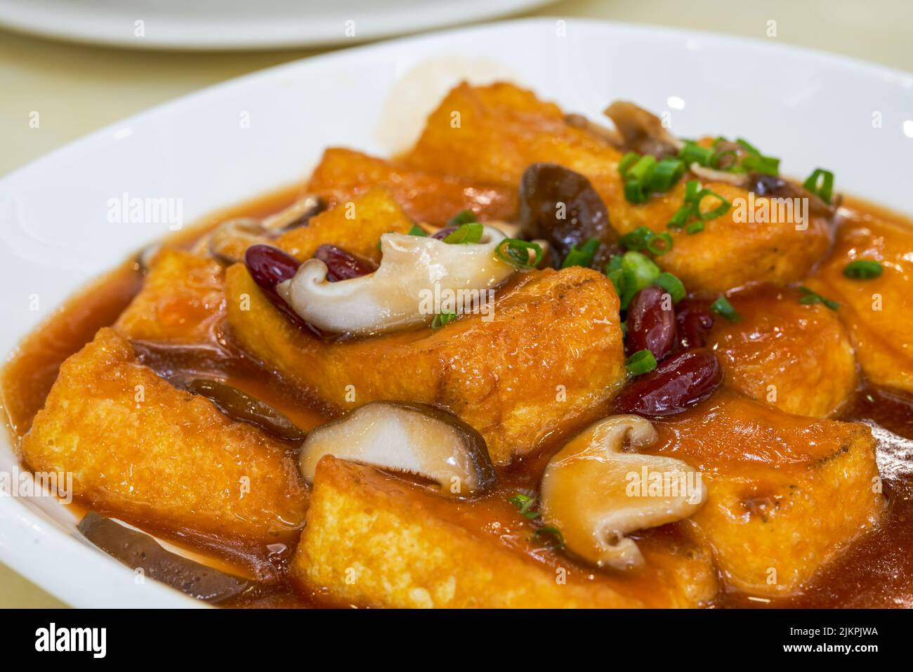 A delicious Chinese dish, home-cooked tofu in sauce Stock Photo - Alamy