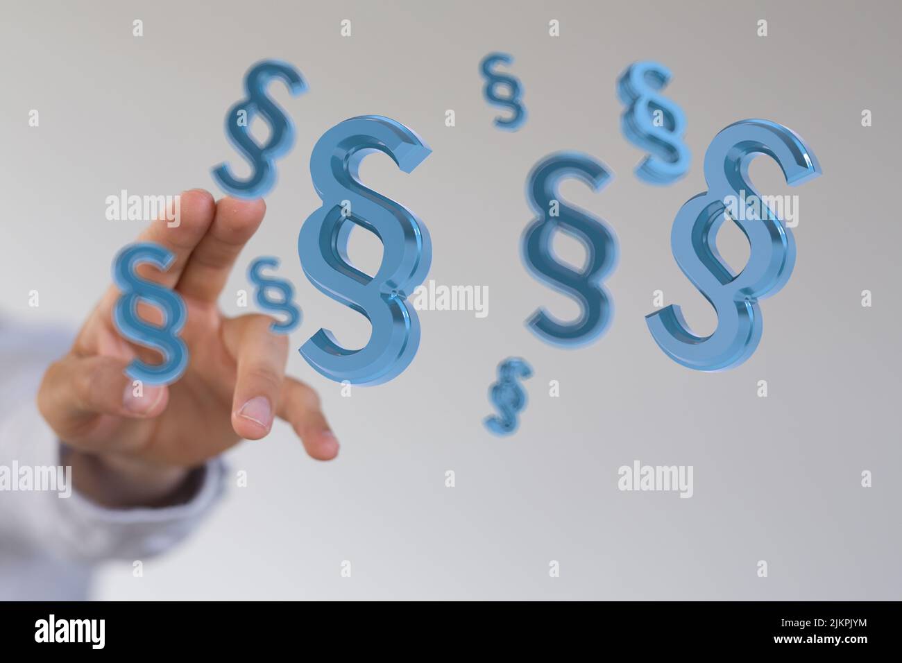 A closeup of a man pointing into 3D rendered paragraph section sign ...