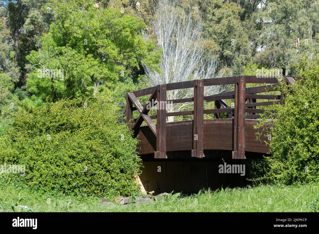 A scenic view of a wooden bridge in the Adventure Park do Jamor in ...
