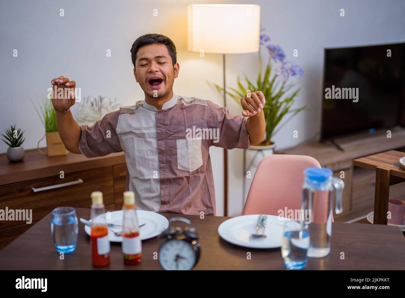 Malaysia family in room hi-res stock photography and images - Alamy