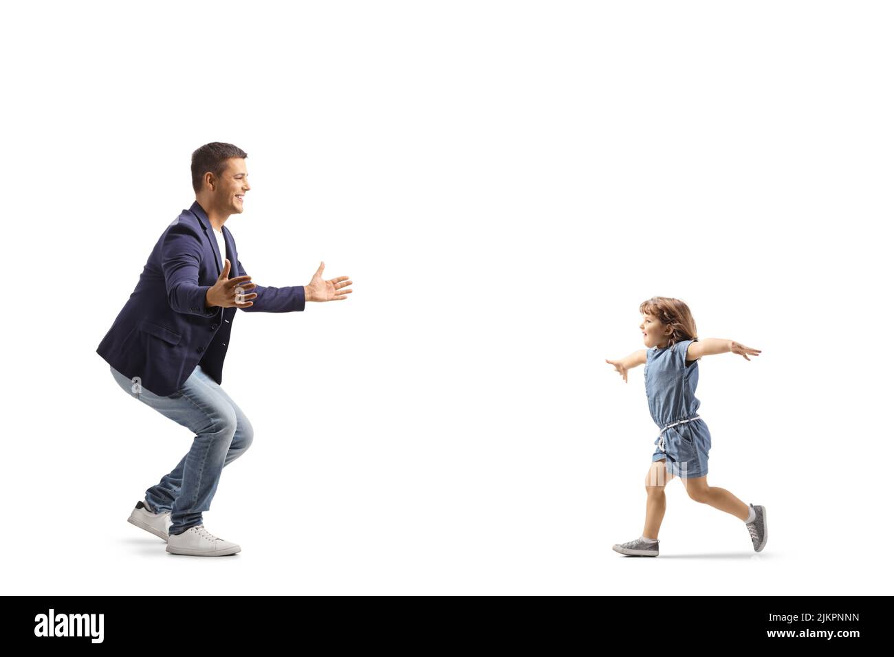 Full length profile shot of a little girl spreading arms and running to ...