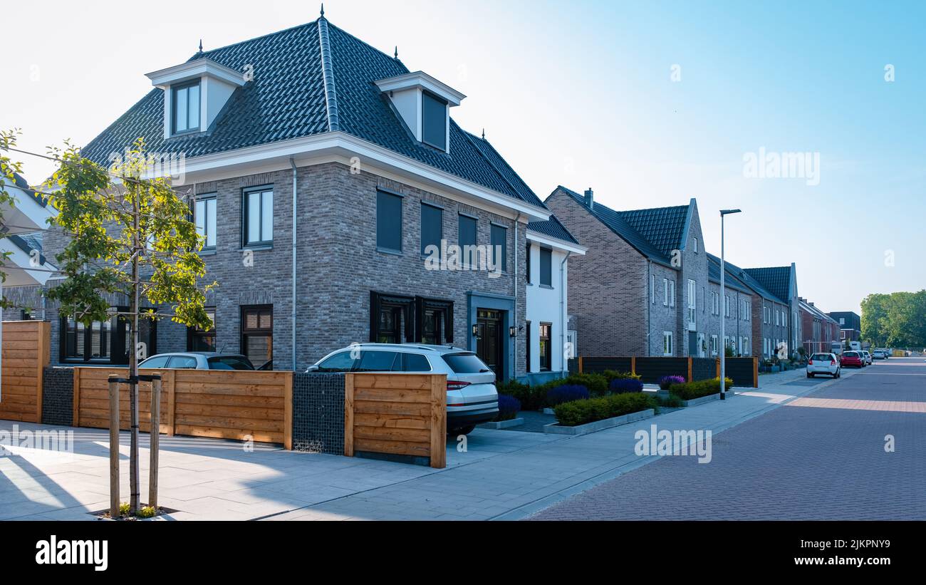 Dutch Suburban area with modern family houses, newly build modern ...
