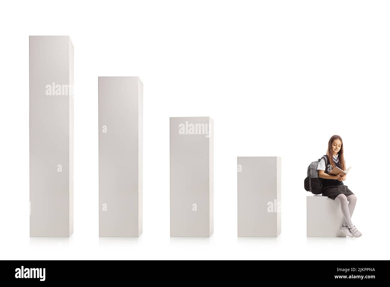Schoolgirl sitting on a column from a bar chart with a book in her ...
