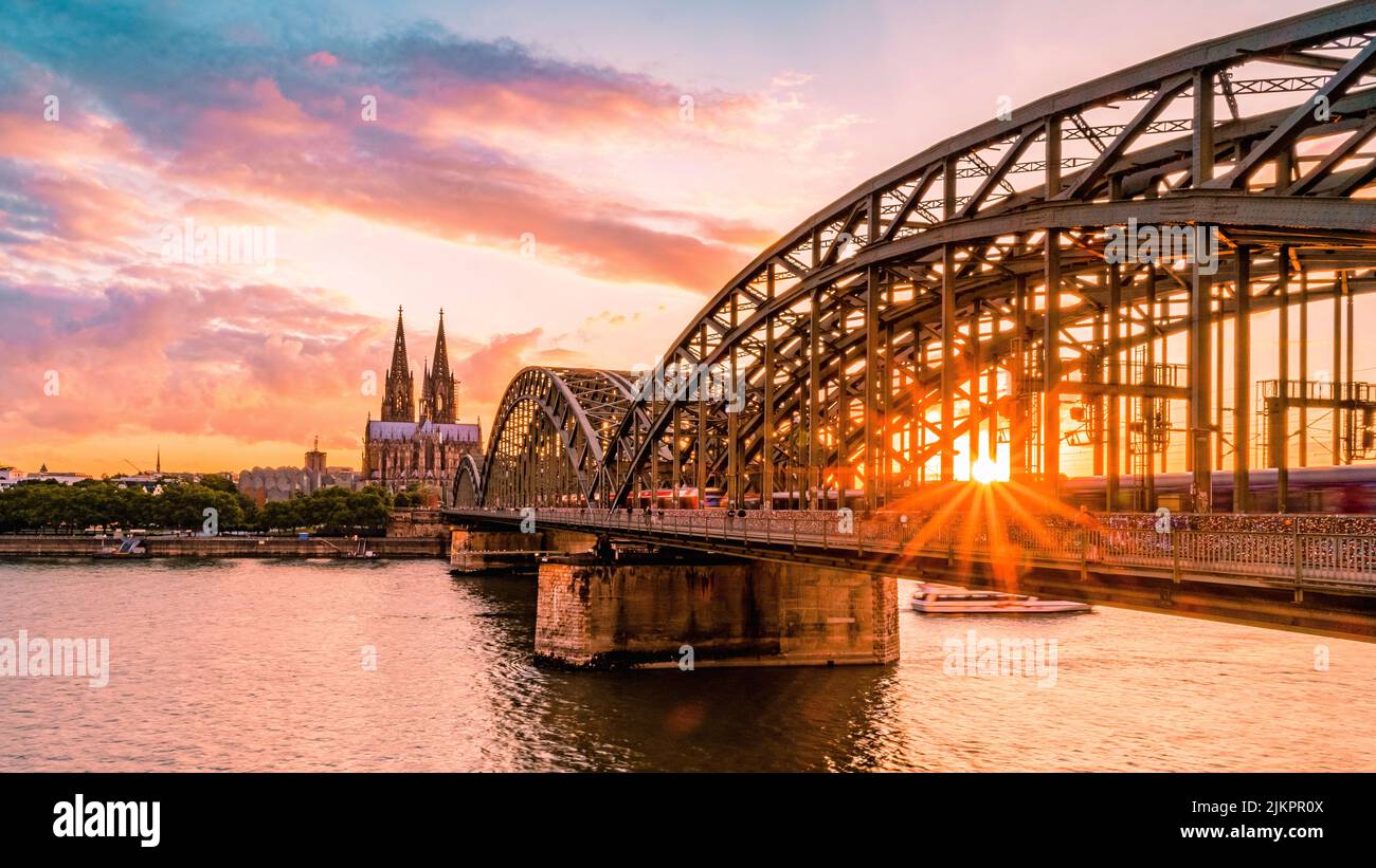 Cologne Koln Germany during sunset, Cologne bridge with the cathedral ...