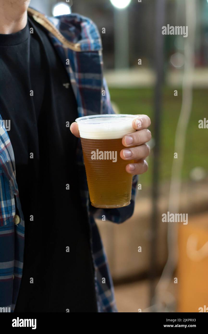 Beer in a plastic cup hi-res stock photography and images - Alamy