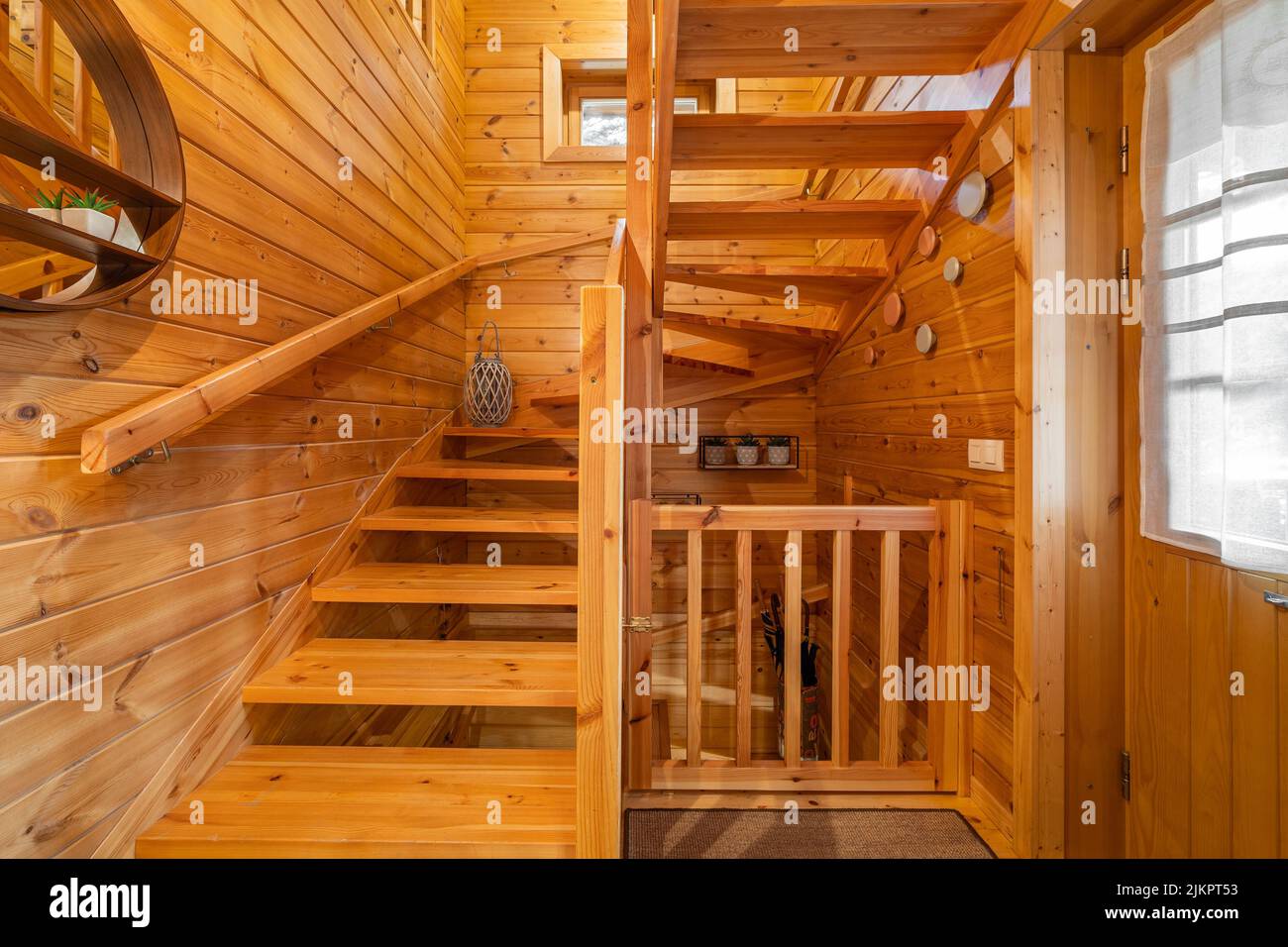 Wooden stairs in a small country house. Hallway of cozy house in a ...