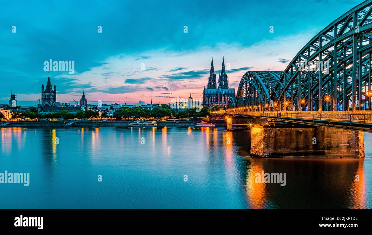 Cologne Koln Germany during sunset, Cologne bridge with the cathedral ...