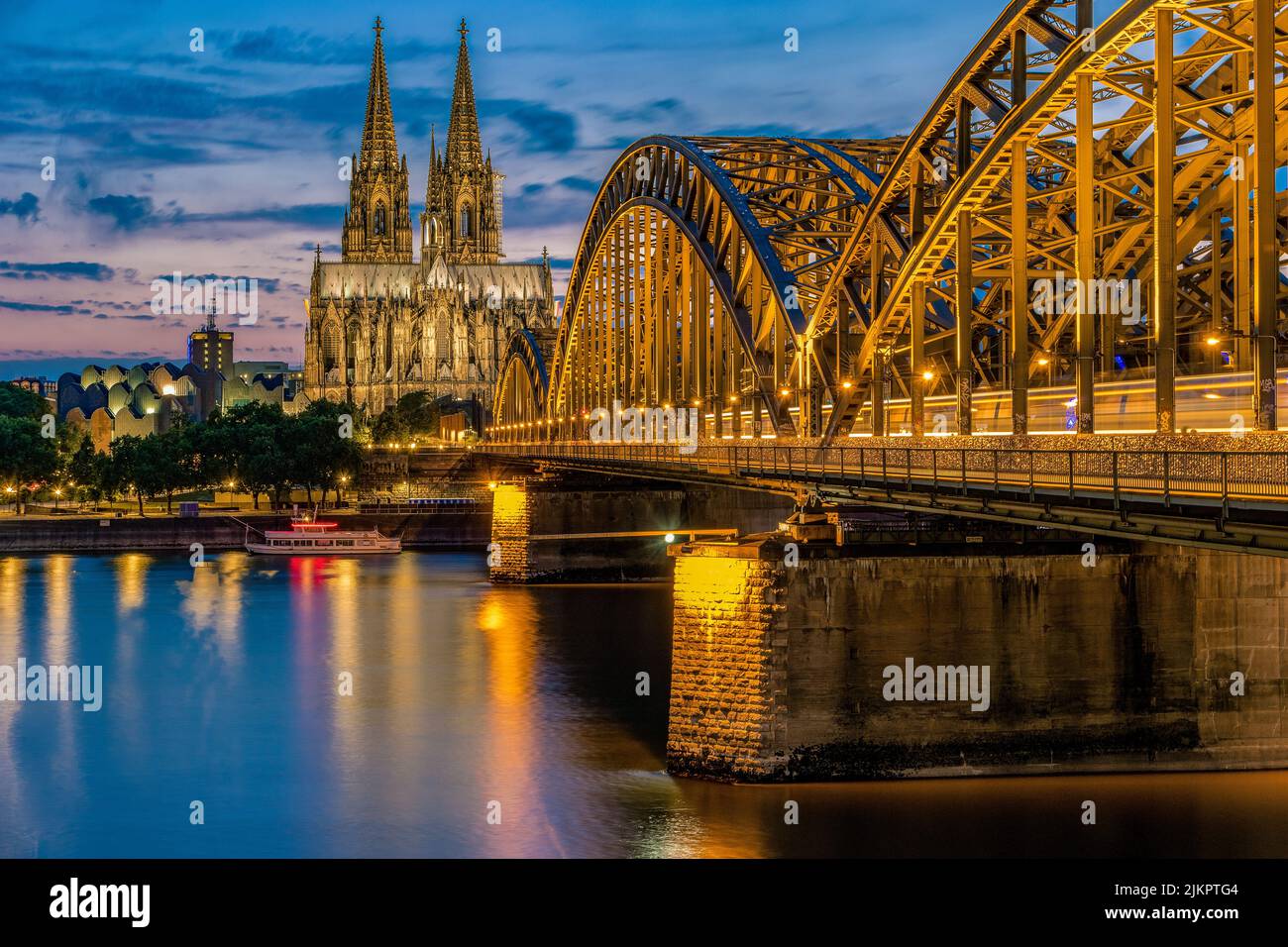 Cologne Koln Germany during sunset, Cologne bridge with the cathedral ...