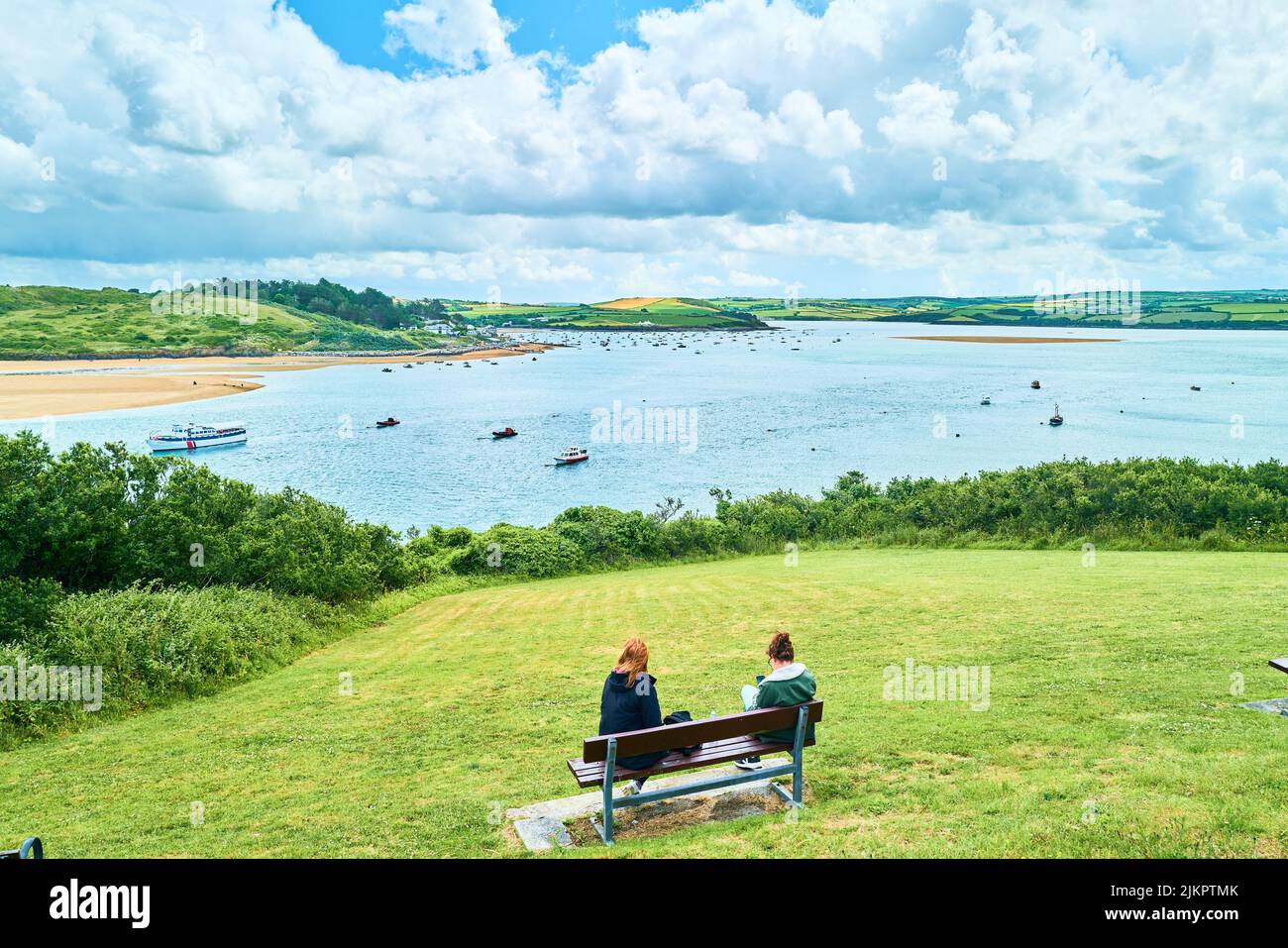 Holiday makers walk tourists cliff couple river camel from padst hi-res ...