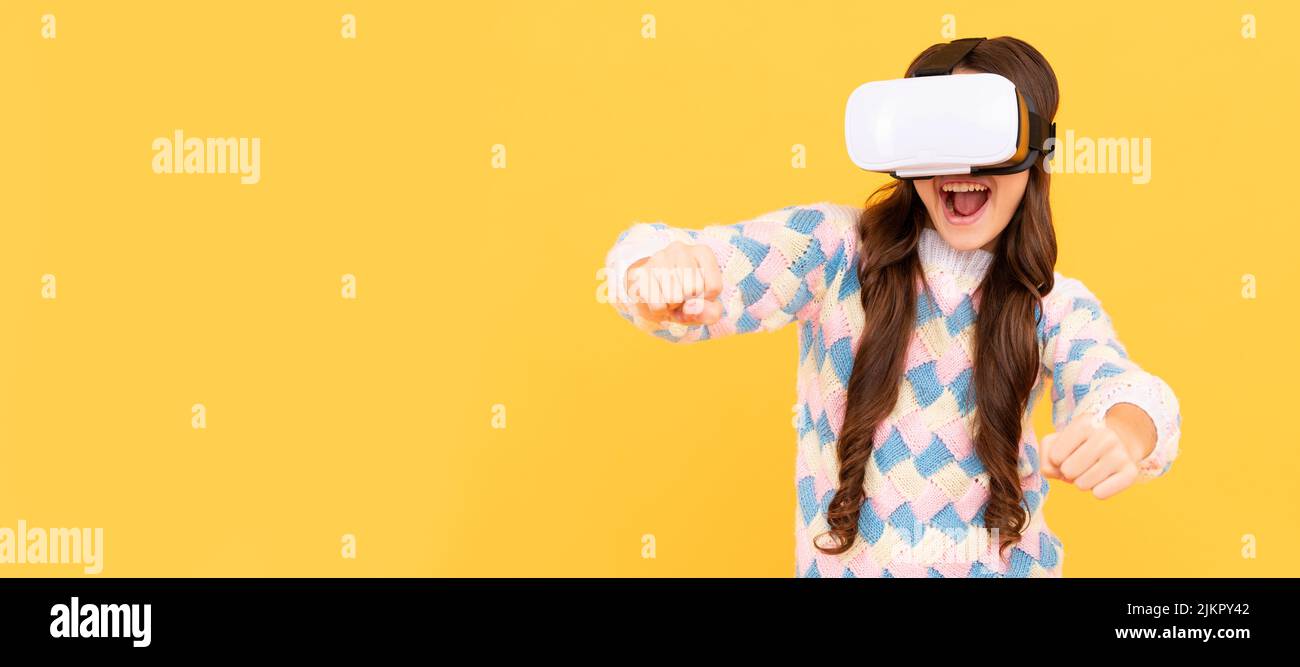 happy teen girl wear wireless VR glasses. using VR headset. kid play ...