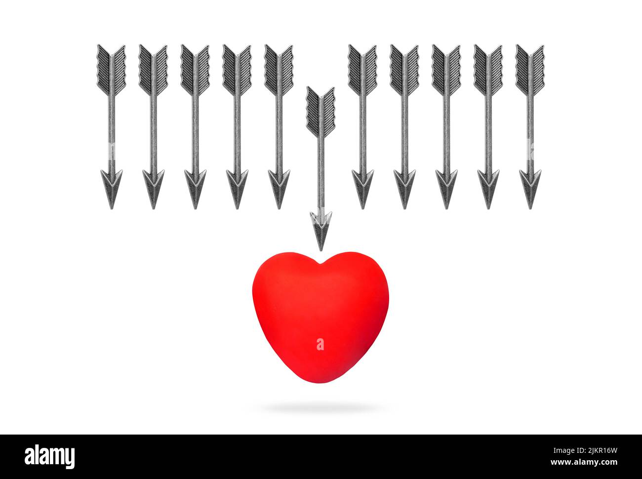 Group of steel bow arrows attacking a red heart shape isolated on white ...
