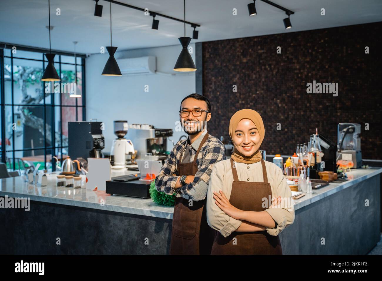 Muslim man restaurant owner hi-res stock photography and images - Alamy