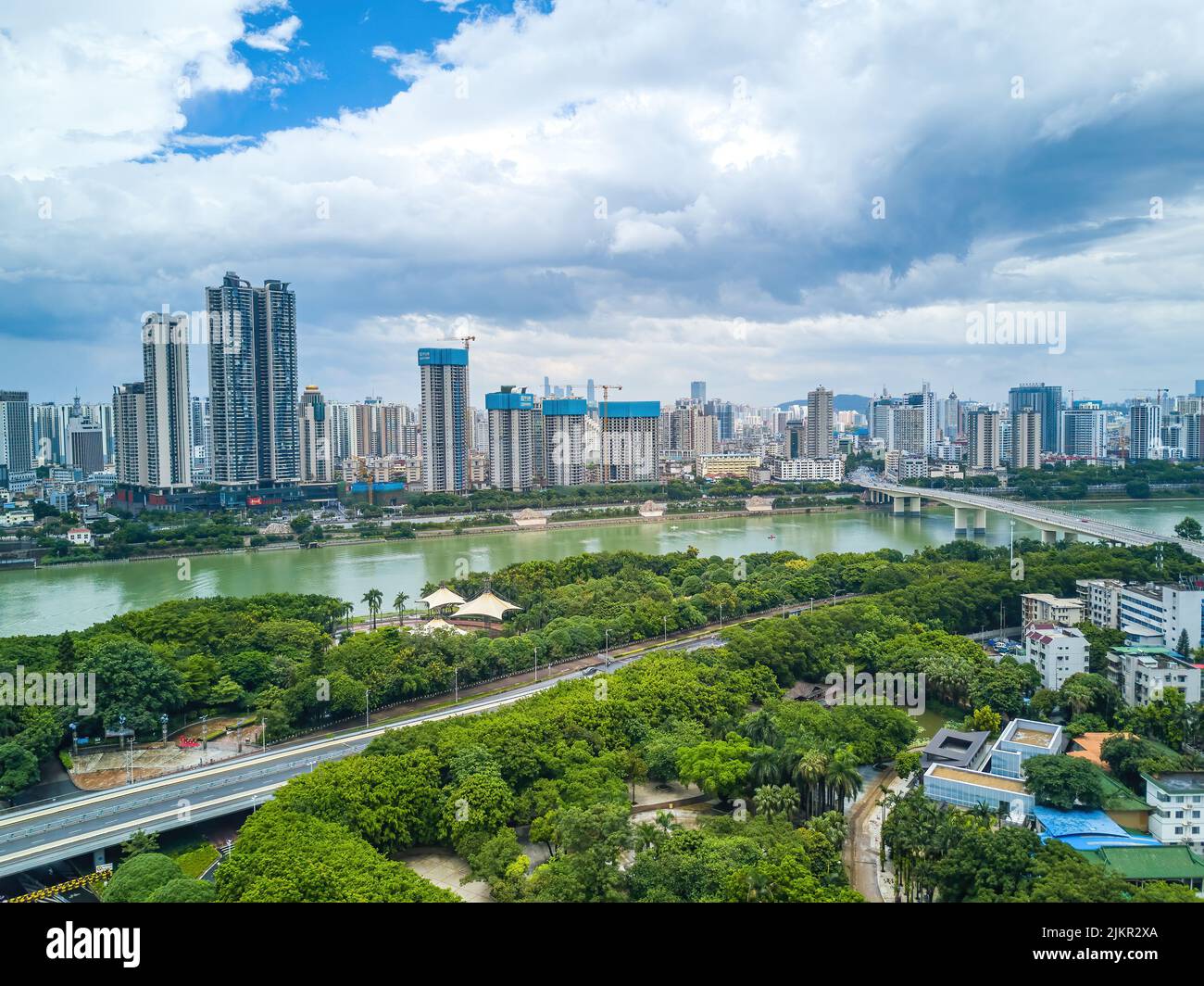 City buildings and river bank landscape in Nanning, Guangxi, China ...