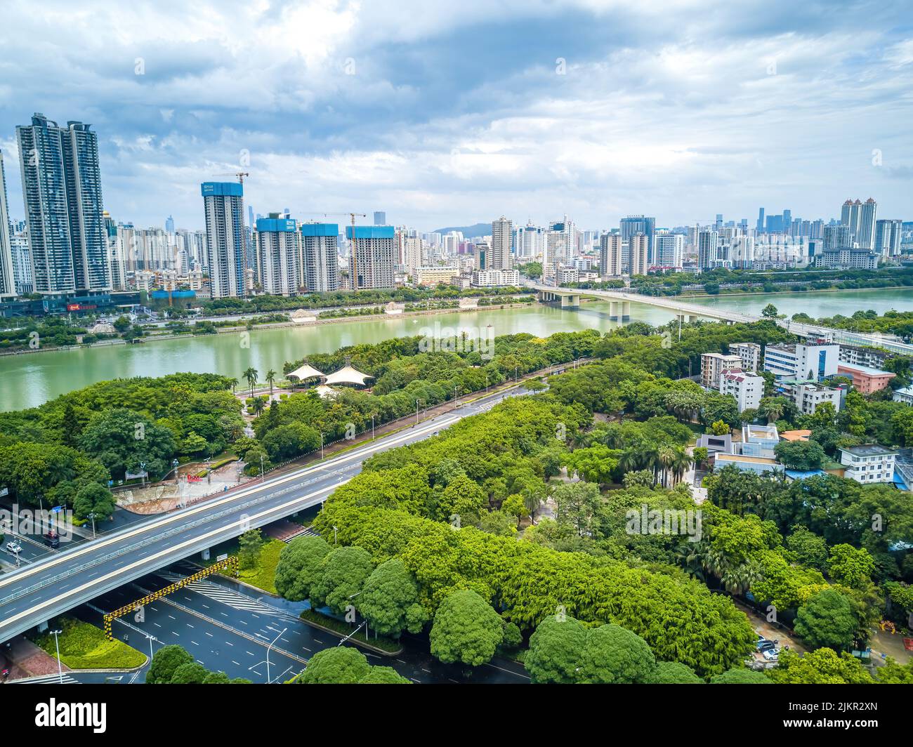 City buildings and river bank landscape in Nanning, Guangxi, China ...