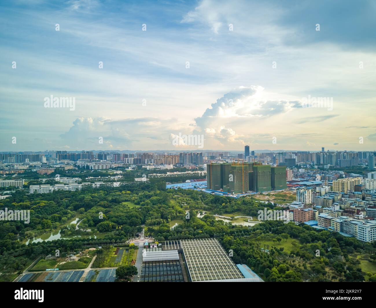 City building complex buildings and highway landscape in evening sunset ...