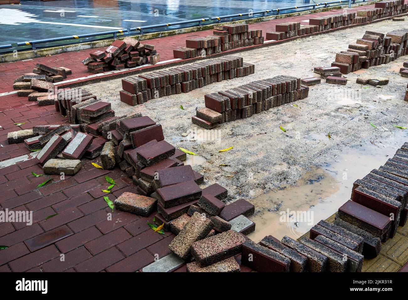 The pavement of the city street is being paved Stock Photo - Alamy