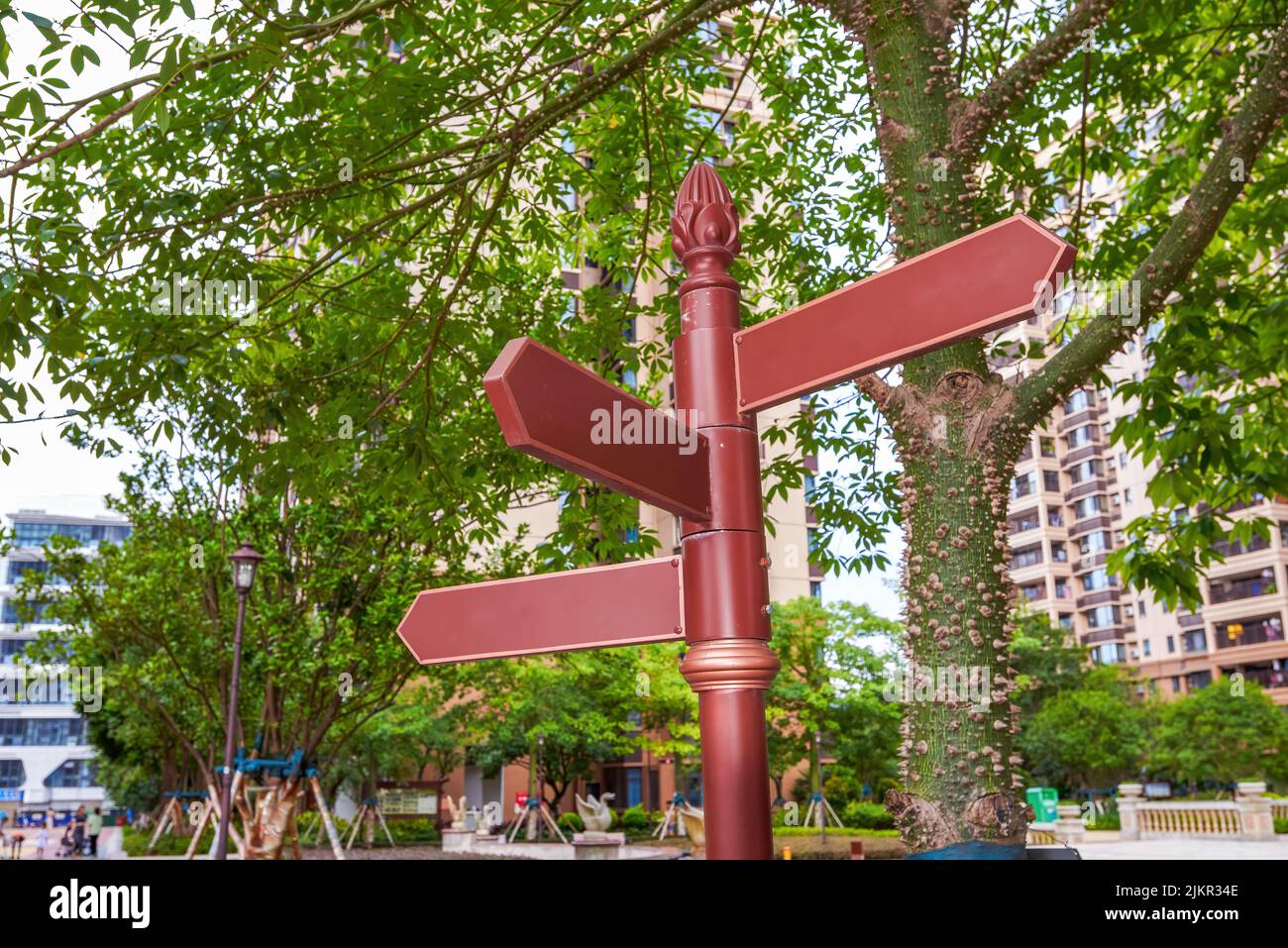 Close-up of directional street signs in residential building complex ...