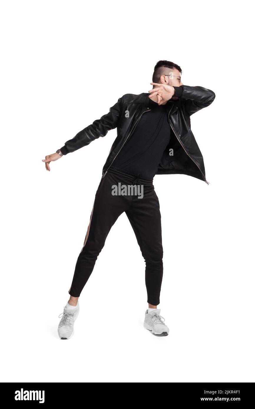 Full-length photo of a funny guy dancing in studio isolated on white ...